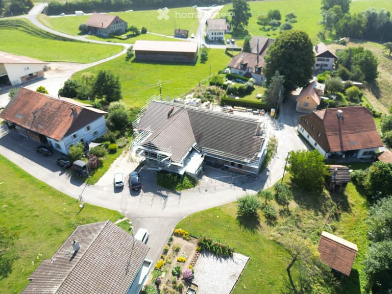 Logements de standing dans une maison paysanne